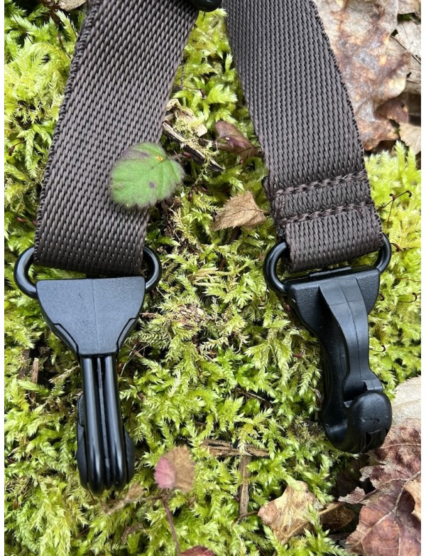 Charge-compensating camera sliding strap